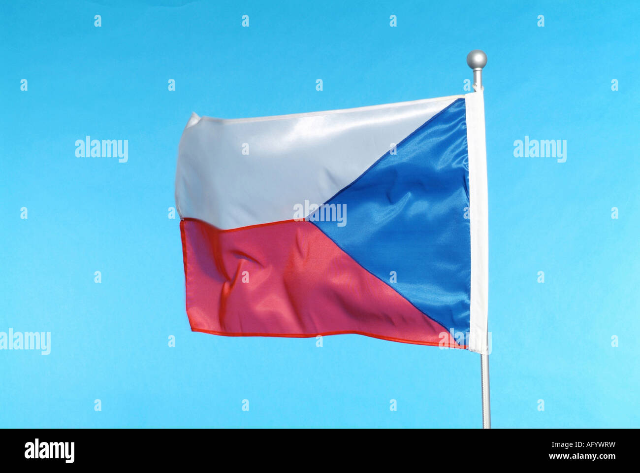 Czech national flag against blue sky Stock Photo - Alamy