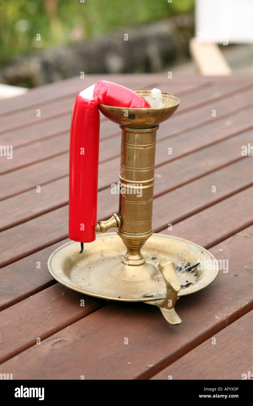 The droopy candle - The morning after the night before Stock Photo - Alamy
