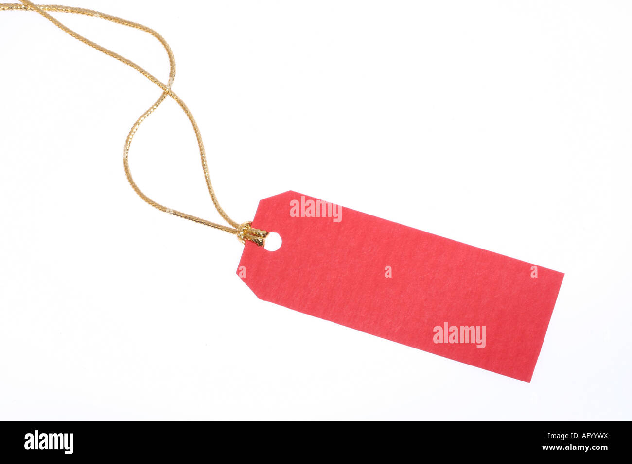 Red gift tag with golden rope Stock Photo - Alamy