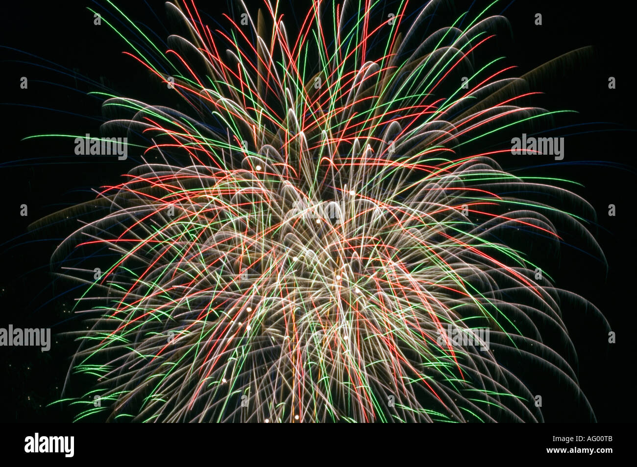 explosion of fireworks in night sky Stock Photo - Alamy