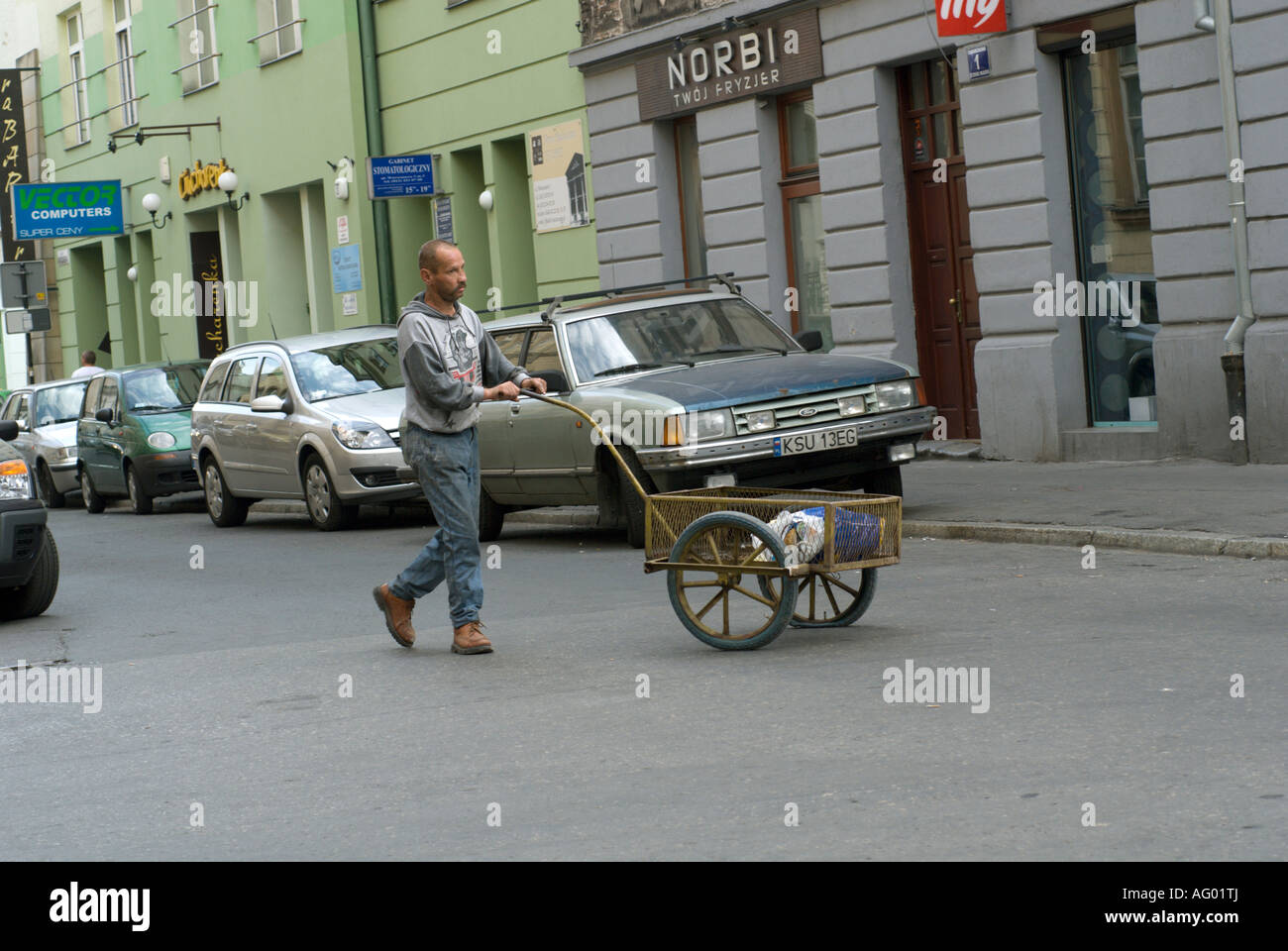 Man on a handcart hi-res stock photography and images - Alamy