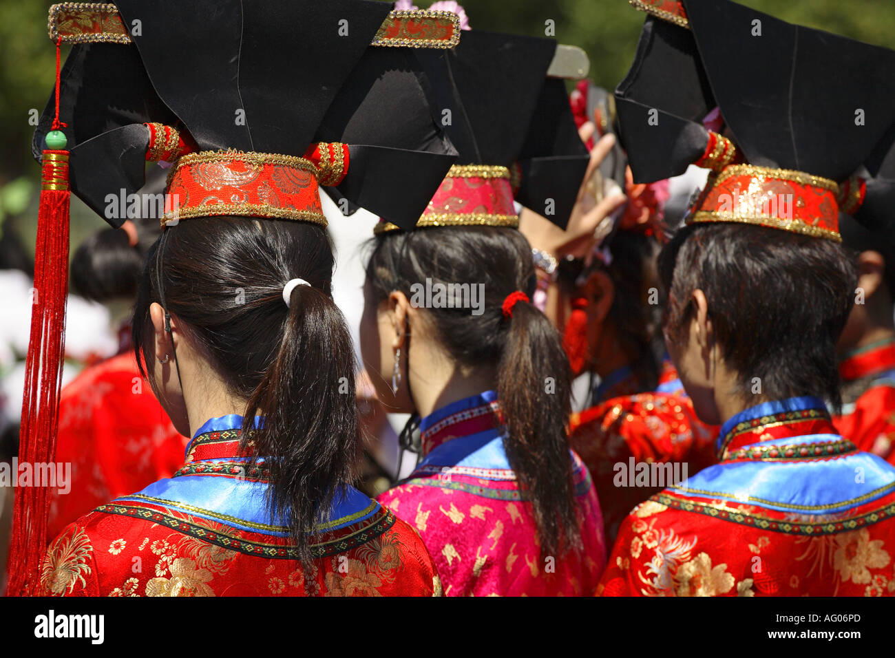 Chinese girls dressed in traditional costumes Stock Photo - Alamy