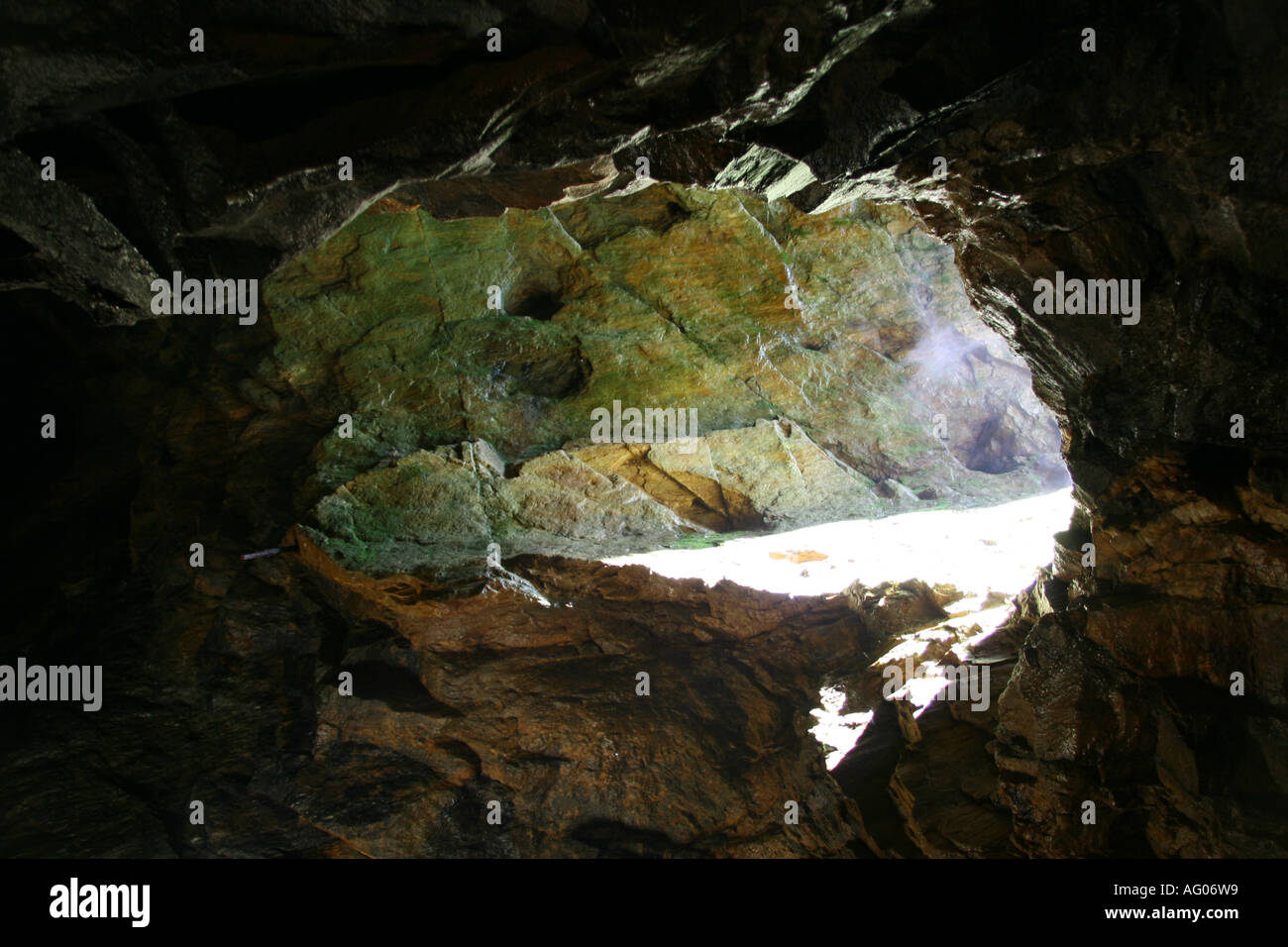 Sunlight and mist peeking into a gold mine Stock Photo - Alamy