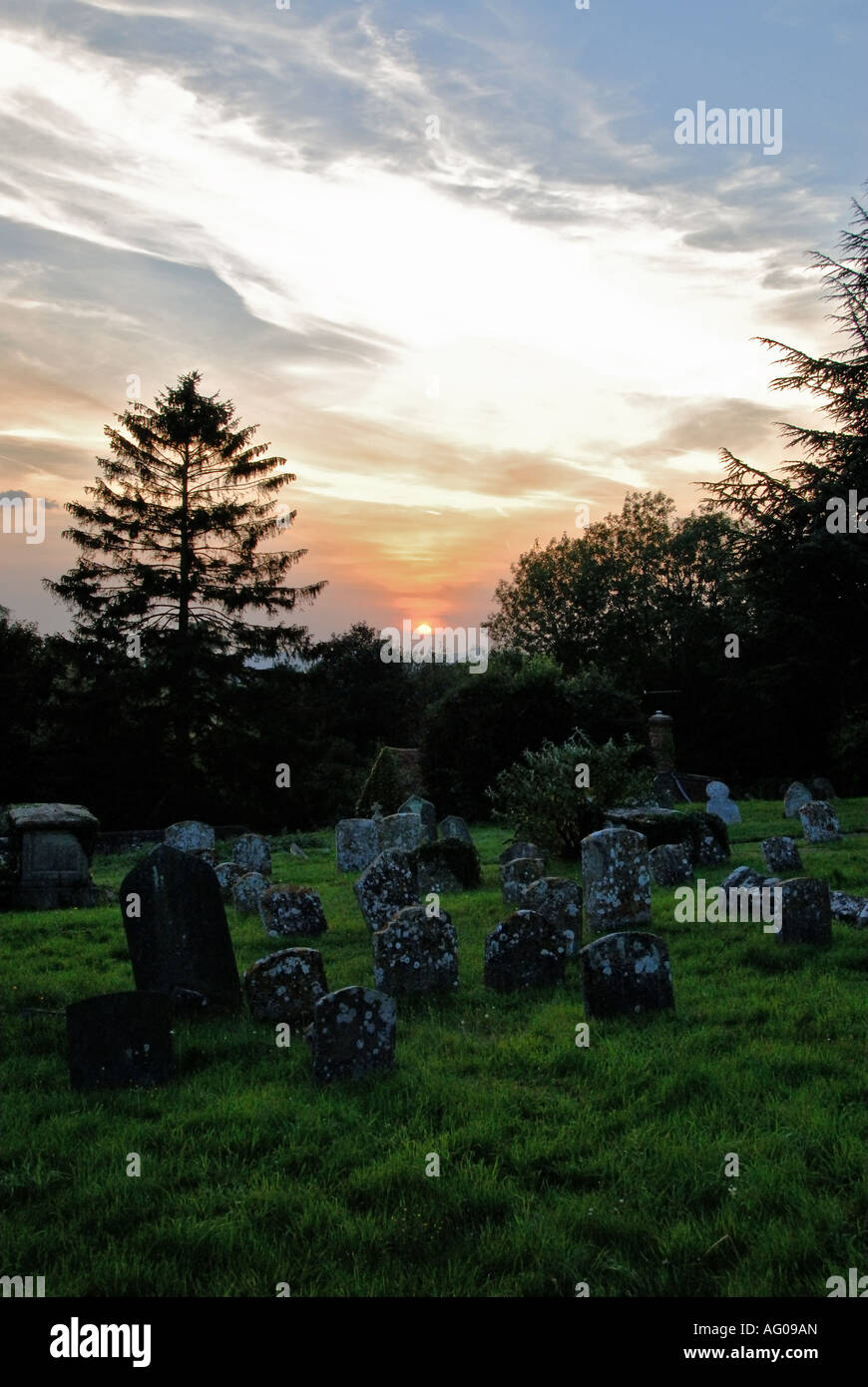 Church graveyard, oxfordshire, England, with Sunset Stock Photo - Alamy