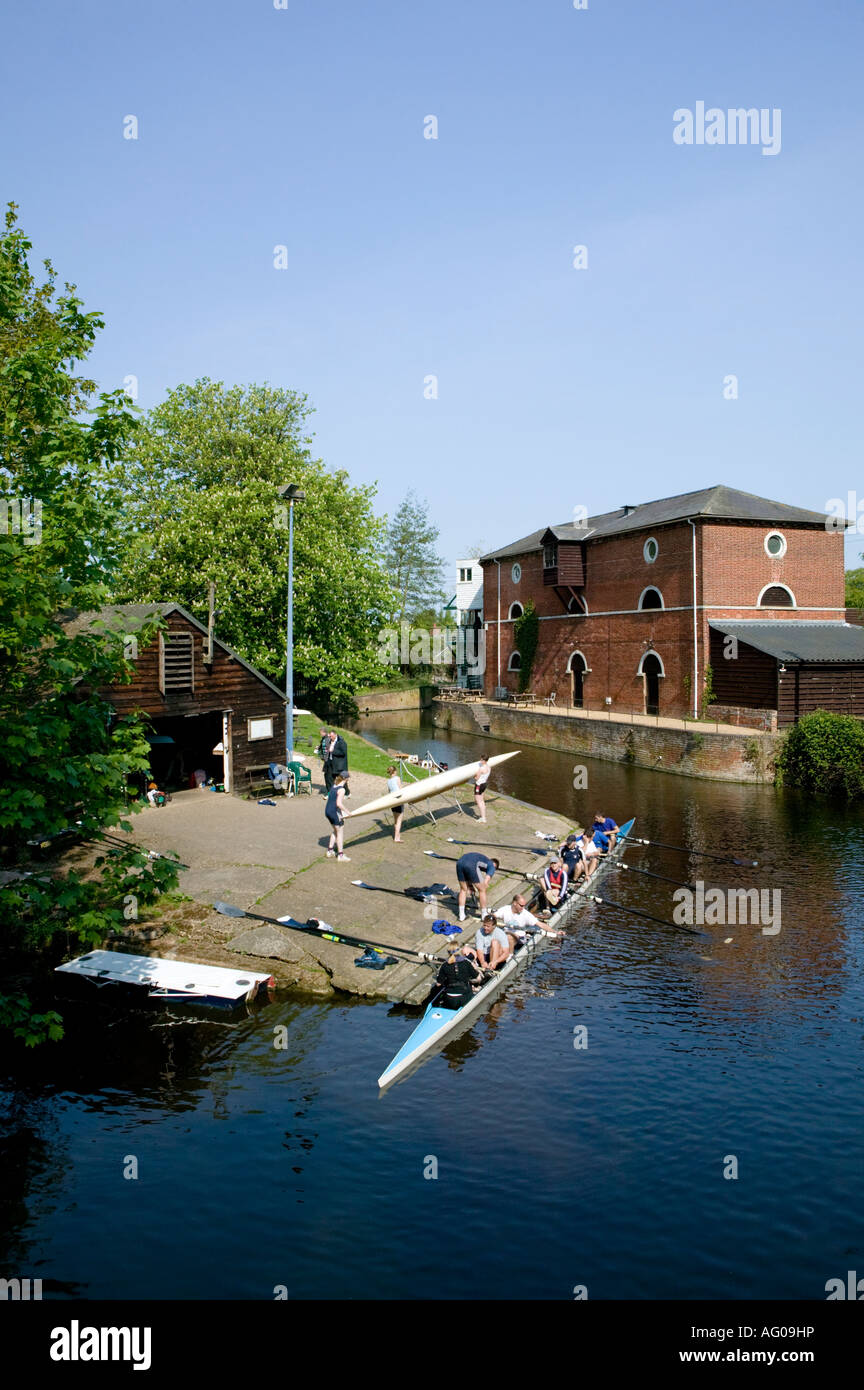 Rowers in coxed eight leaving Sudbury Rowing Club boathouse, Quay ...