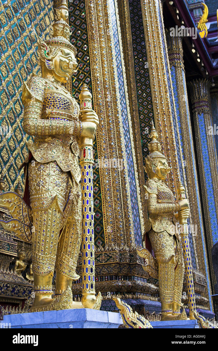 Gilded Statue guarding the Royal Temple in Bangkok Stock Photo - Alamy