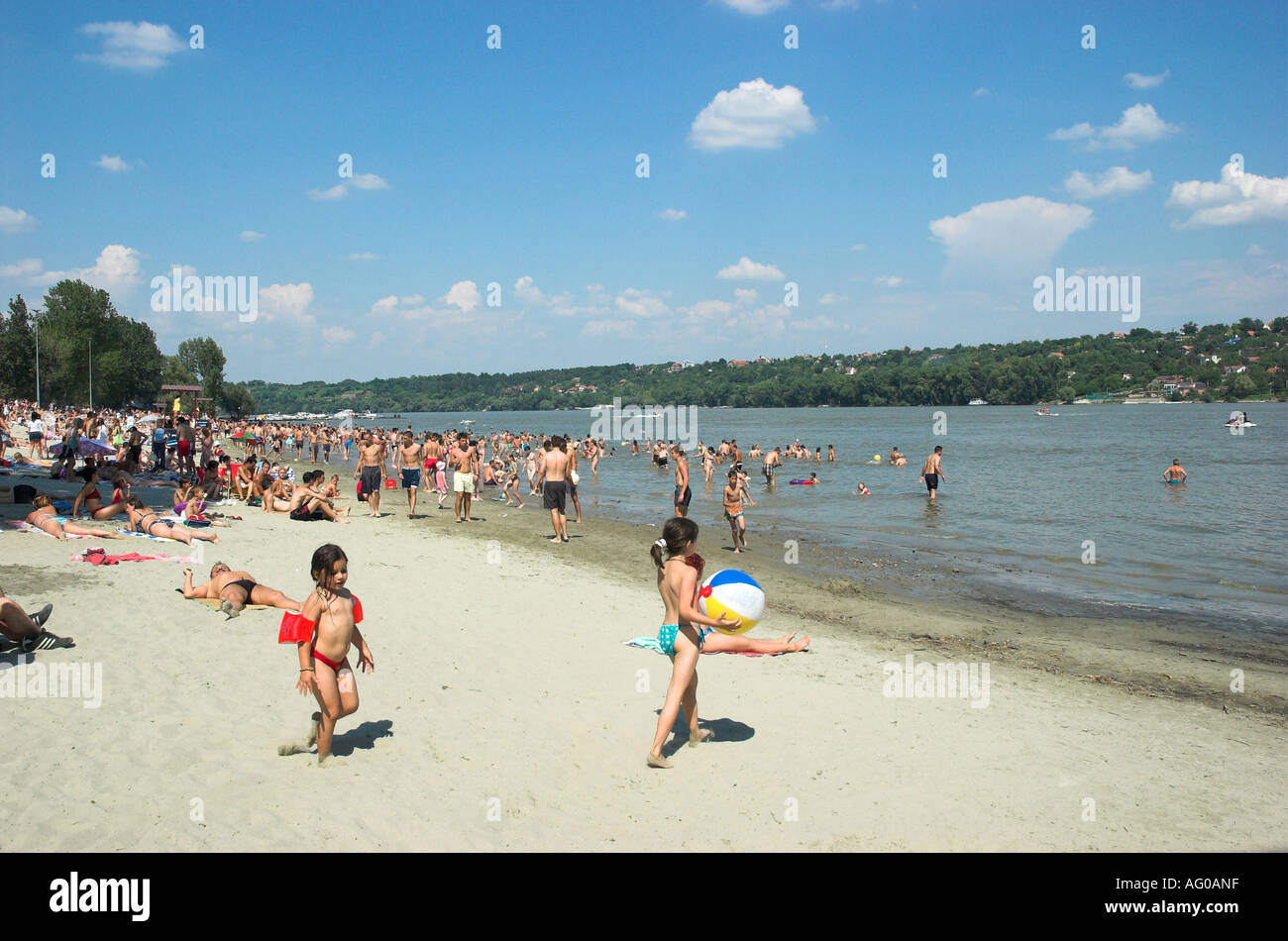 Sunbathers enjoy the beach on the Danube River, Novi Sad, Serbia, July ...