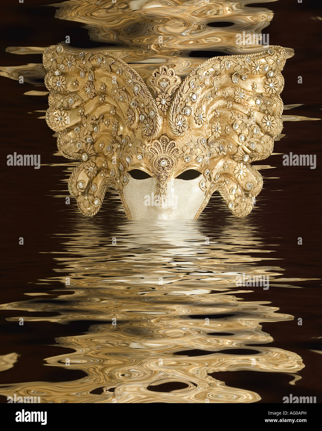 Gold mask and reflection Stock Photo - Alamy