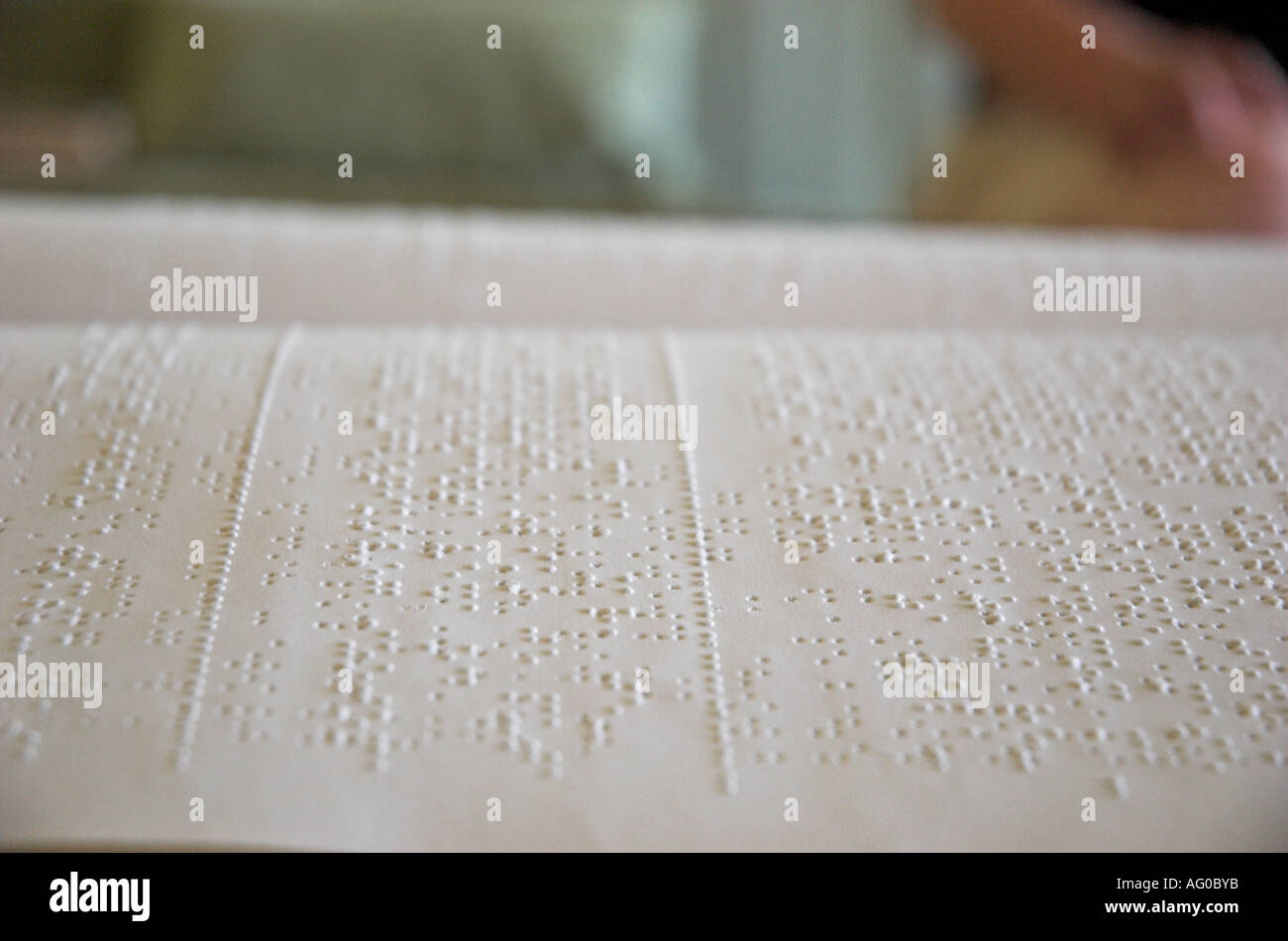 Open book with brail on pages Stock Photo - Alamy