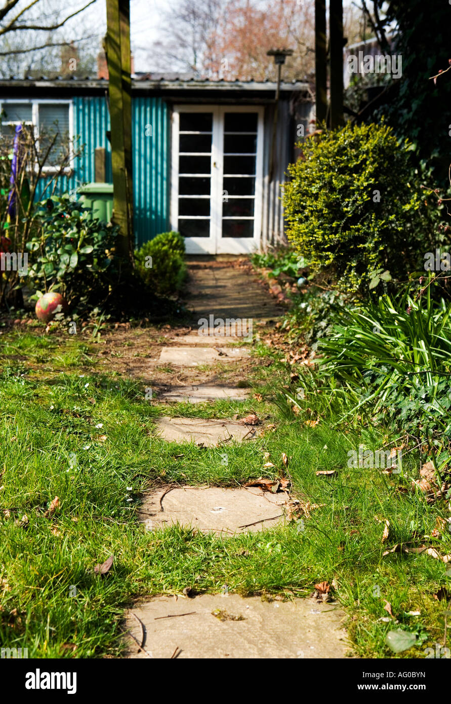 Pathway leading to Garden shed Stock Photo - Alamy
