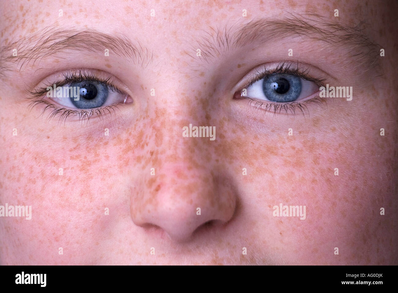 A smiling freckle faced 11 year old Australian girl of Irish origin ...