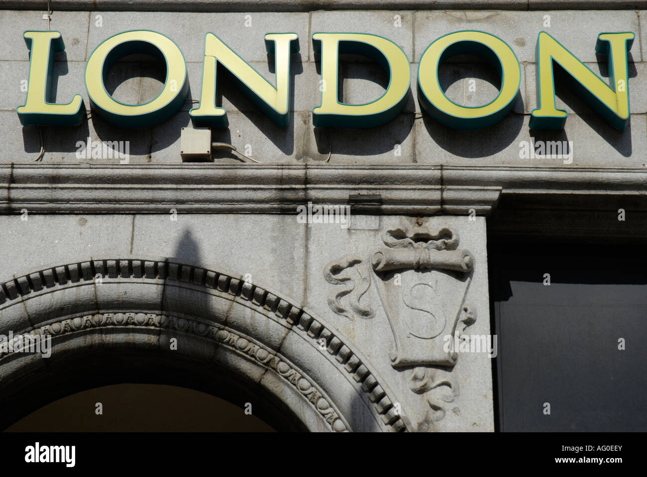 Large sign on old building with letters making up the word London Stock ...