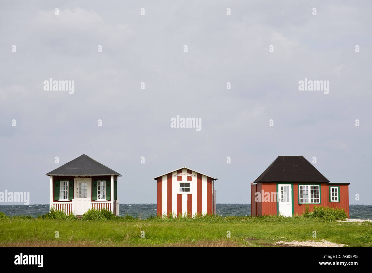 Three Individual Three colourful tiny beach houses typically Danish and ...