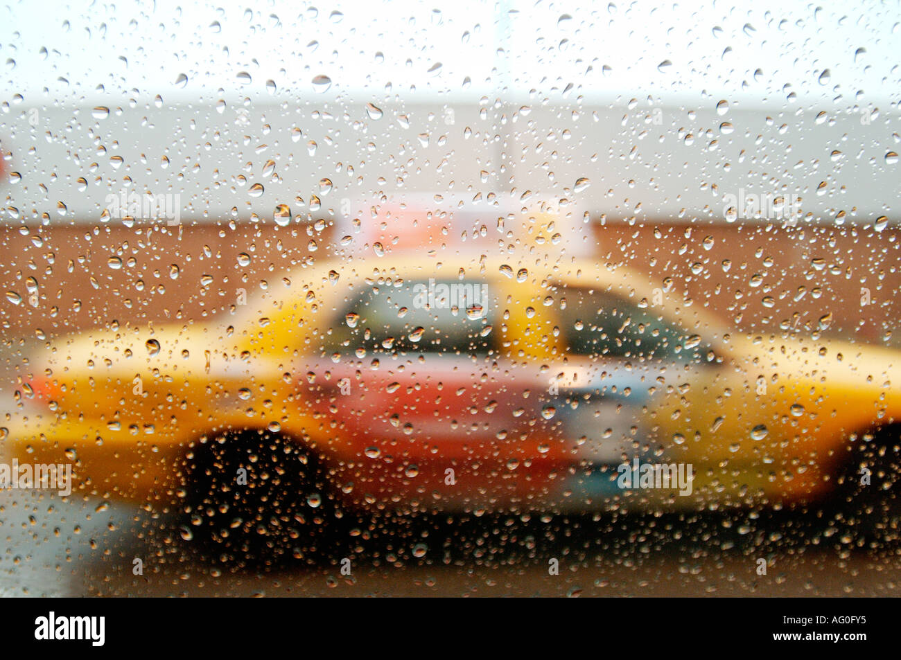 Yellow cab in Chicago Illinois as seen through car window and rain ...