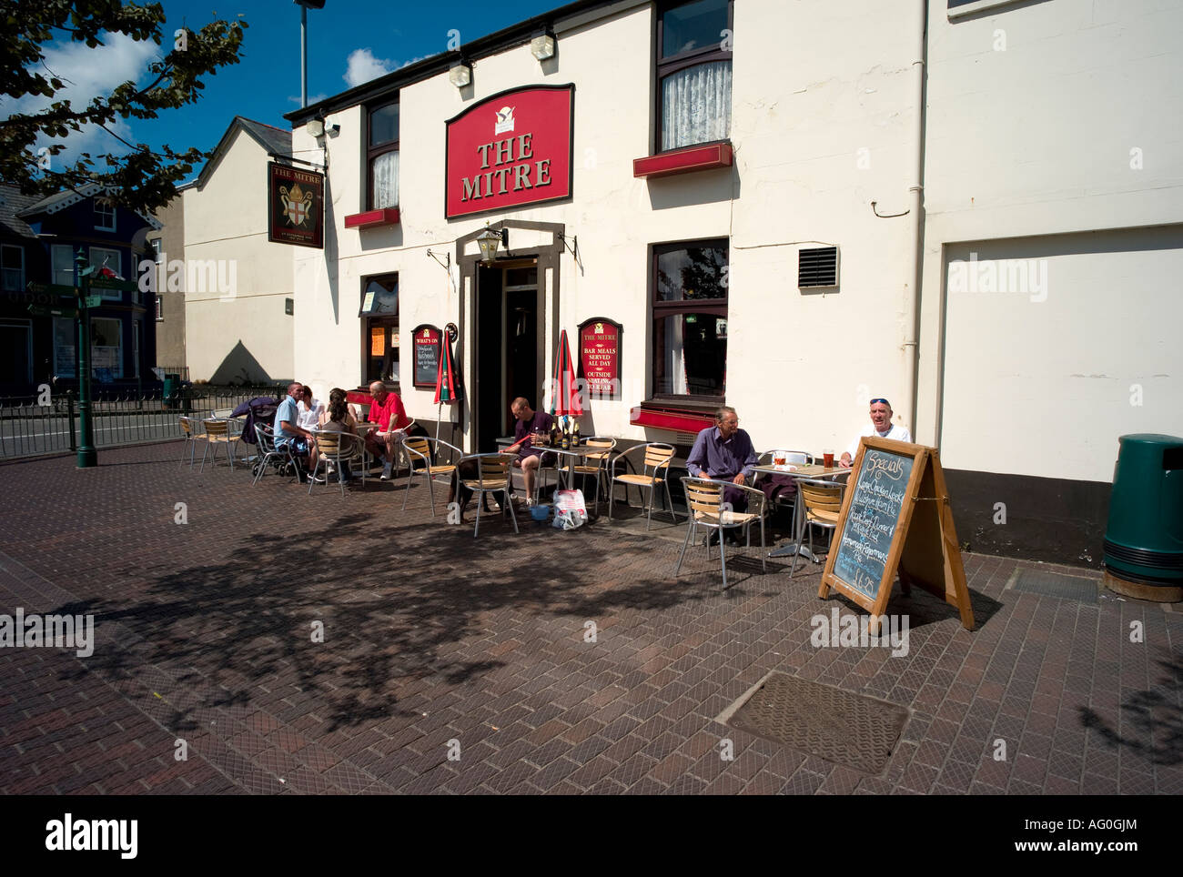 People sitting outside and drinking in the sunshine The Mitre pub ...