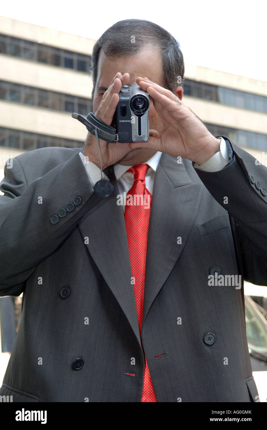 MAN WITH CAMCORDER Stock Photo - Alamy