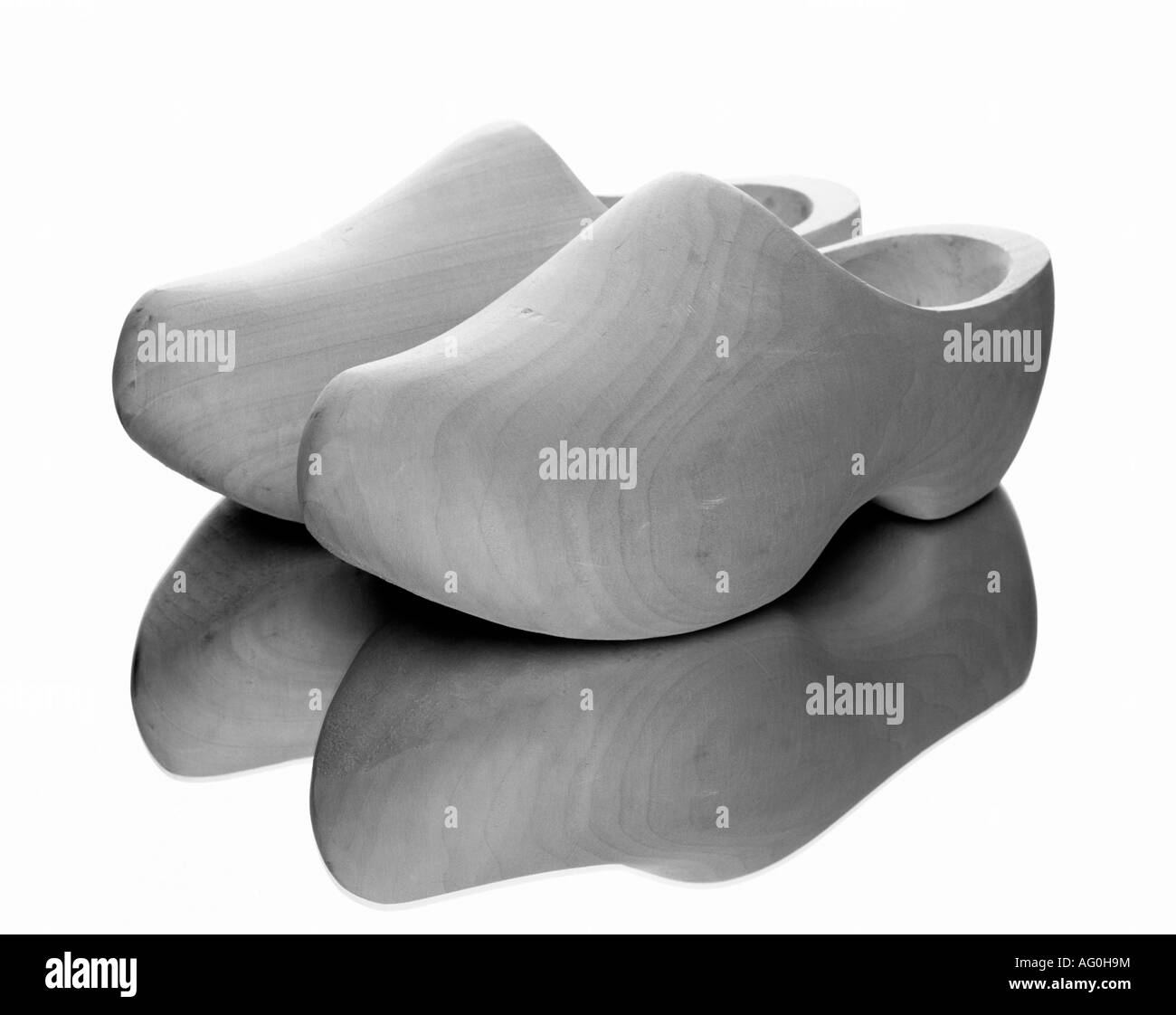 Closeup of a pair of plain traditional wooden Dutch clogs Stock Photo ...