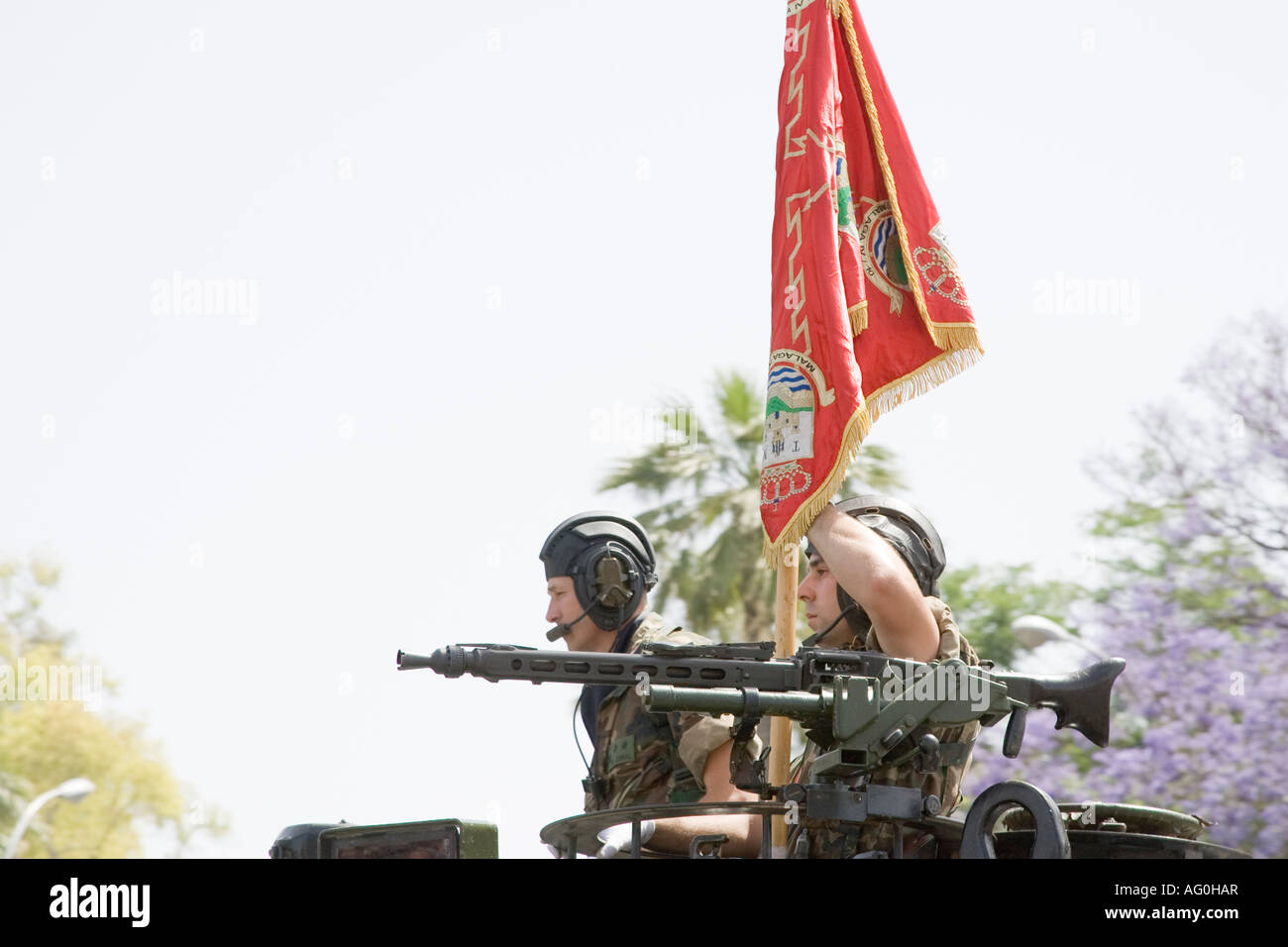 Detail of turret of a marching tank with a couple of soldiers Stock ...