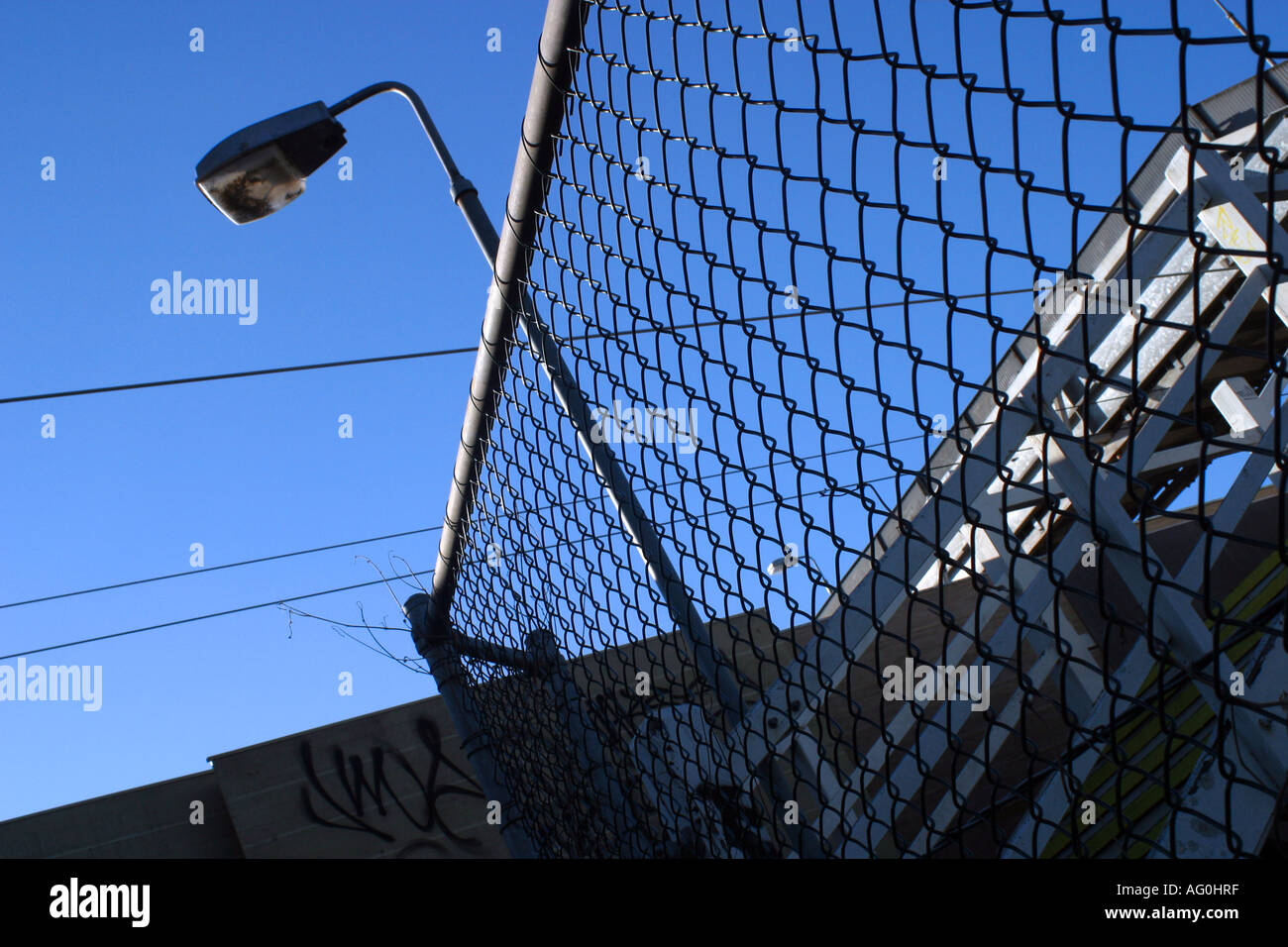 Urban fence with a graffiti wall Stock Photo - Alamy