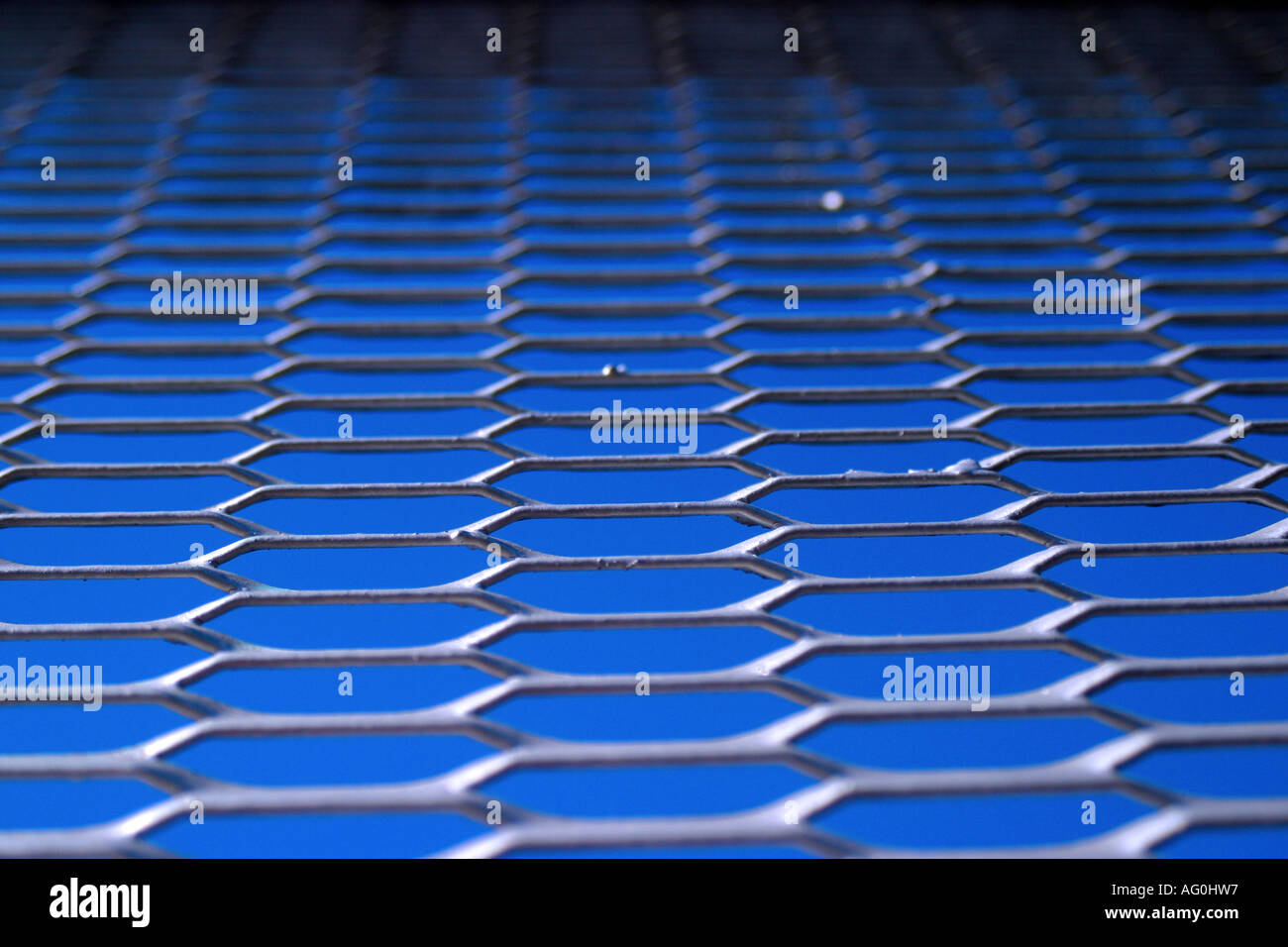 Hexagon shaped fence close up Stock Photo - Alamy