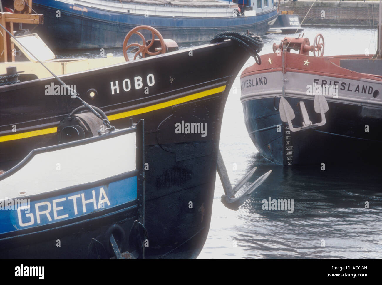 The bows of several Dutch barges at Surrey Docks London England UK ...