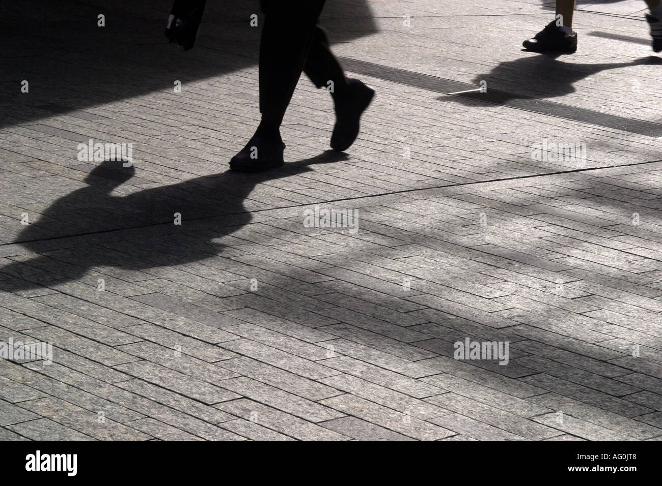 Urban street with people walking Stock Photo - Alamy