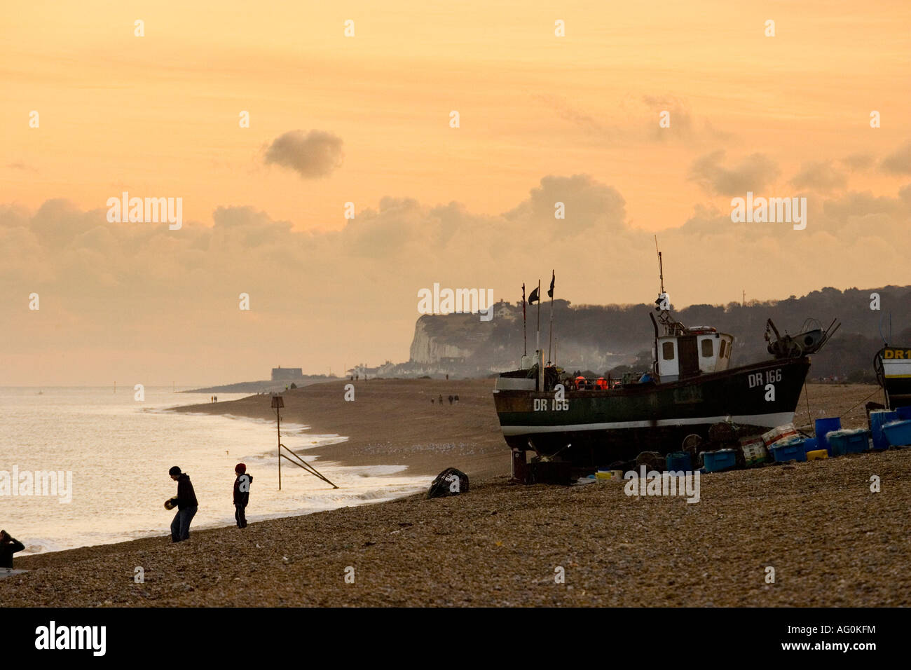 Fishing boat on Walmer beach at sunset in Deal, Kent, England Stock ...