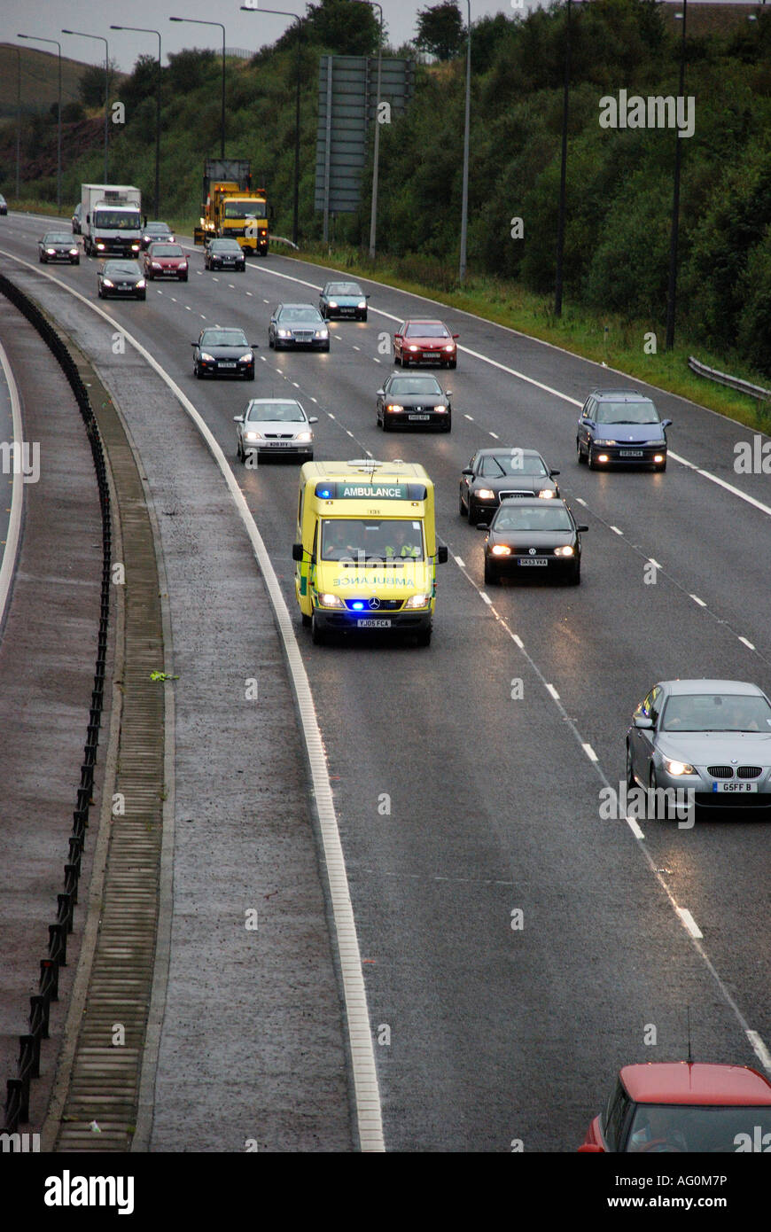 ambulance in the fast lane of the M62 Huddersfield Stock Photo - Alamy