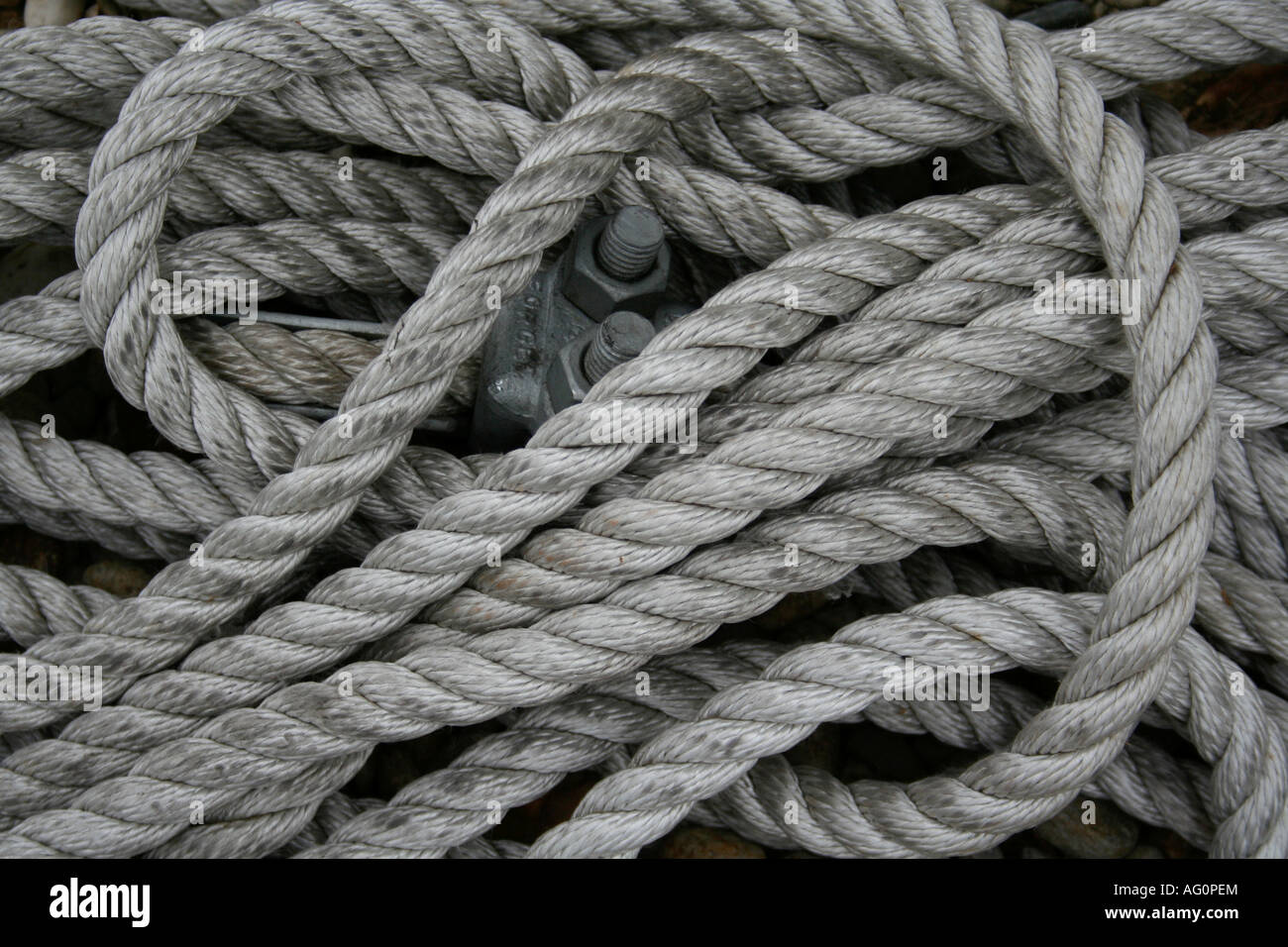 White Nylon Rope that has been soiled to gray with a double steel bolt ...