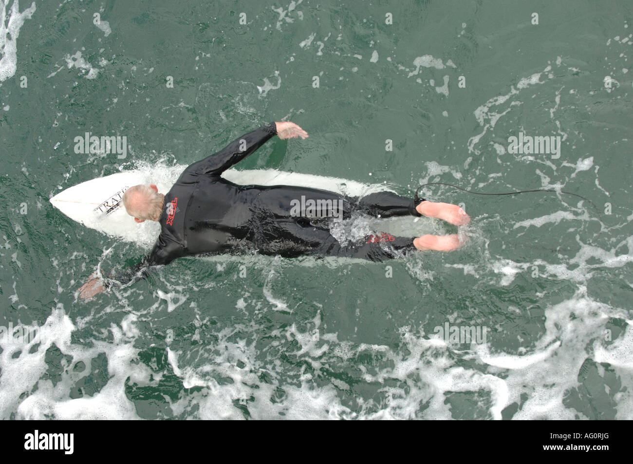 Older man surfing Stock Photo - Alamy