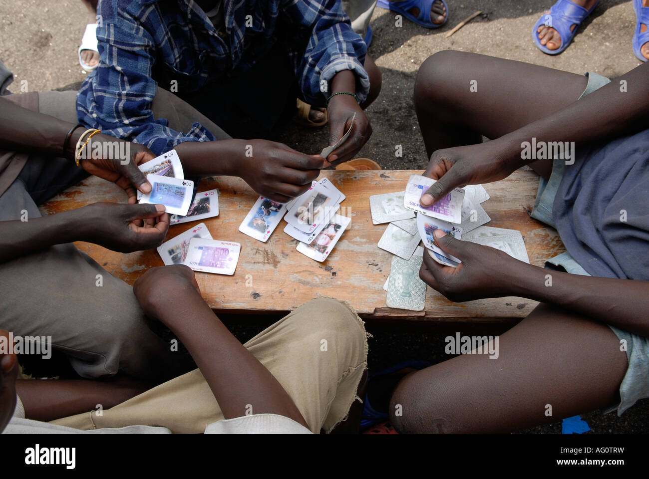 Young Congolese men play cards in North Kivu province, DR Congo Africa ...