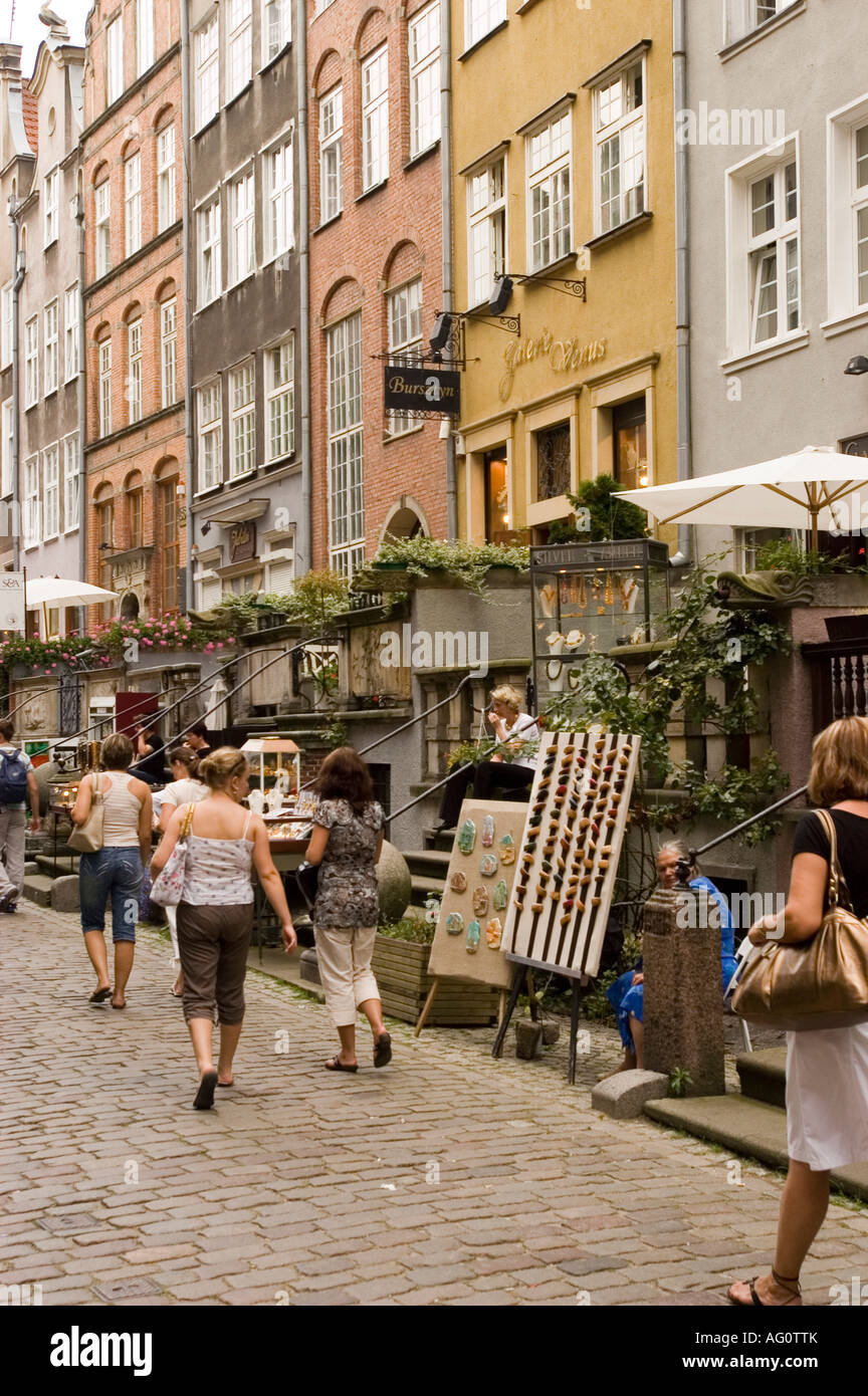 People walking by heritage Hanseatic Renaissance buildings on Swietego ...
