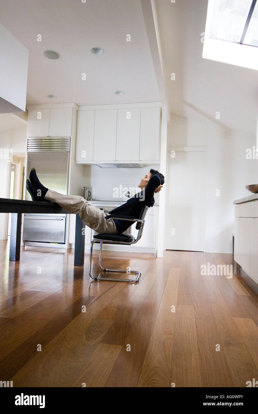 Asian male leaning back in hi-res stock photography and images - Alamy