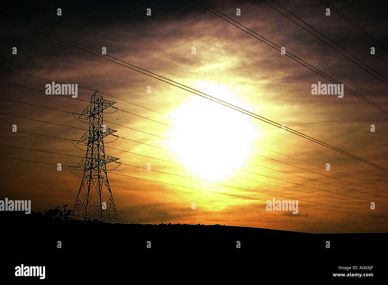 Sun set with pylons hi-res stock photography and images - Alamy
