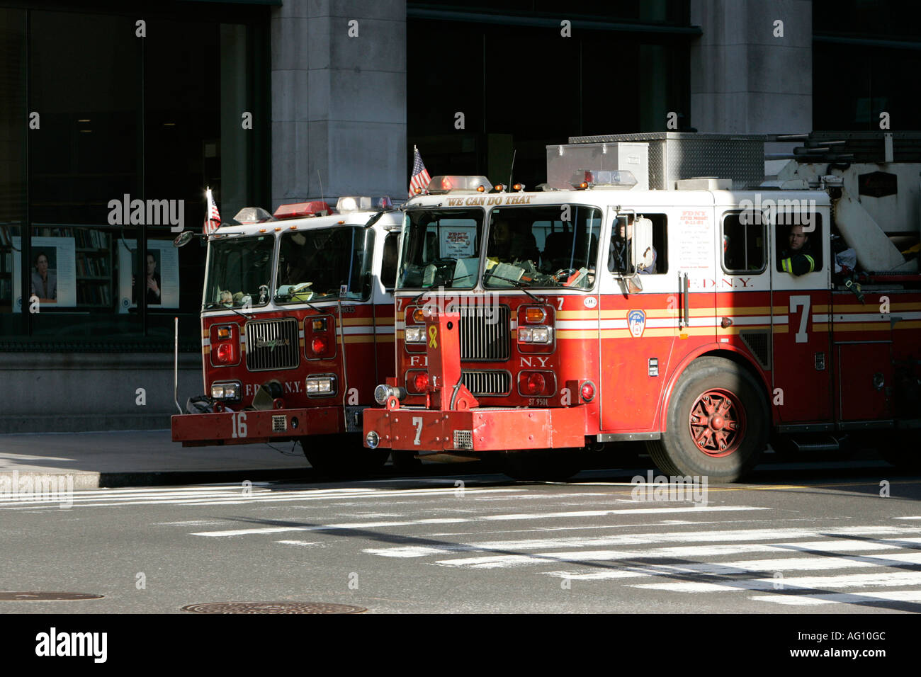 two FDNY fire engines 16 and 7 wait beside crosswalk 34th Street new ...