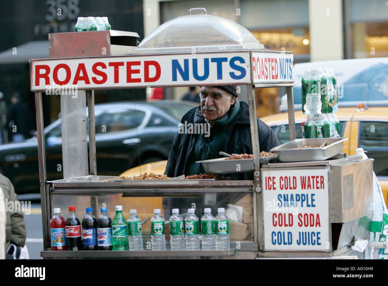 Street vendor selling roasted nuts hi-res stock photography and images ...