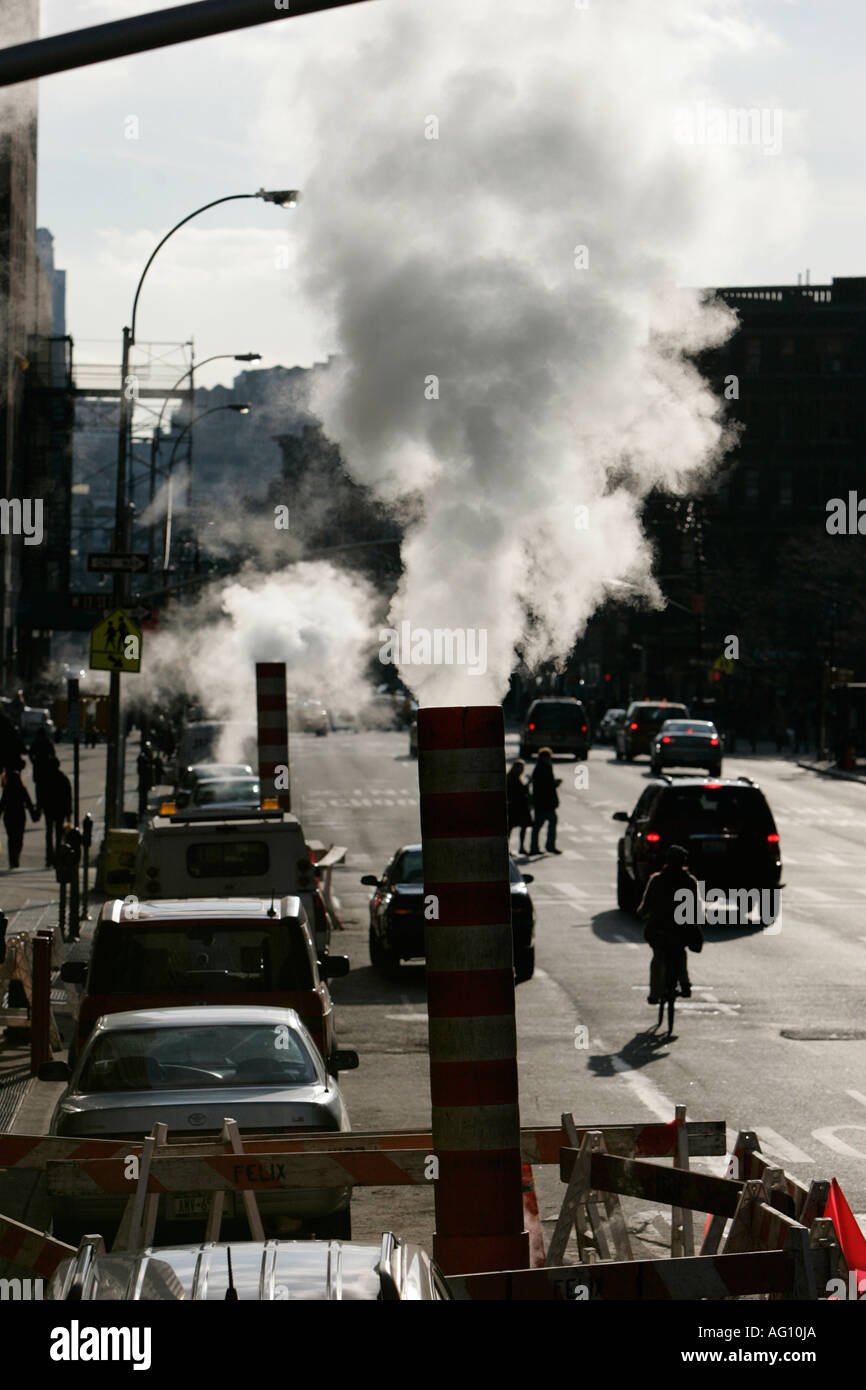 steam pipe vent stack backlit with traffic new york city new york USA ...