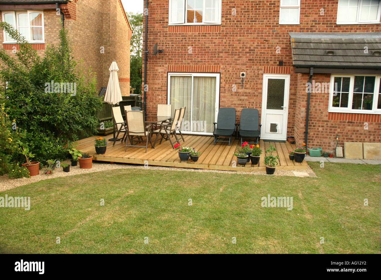 Deck in Back Garden of Detached House Stock Photo - Alamy