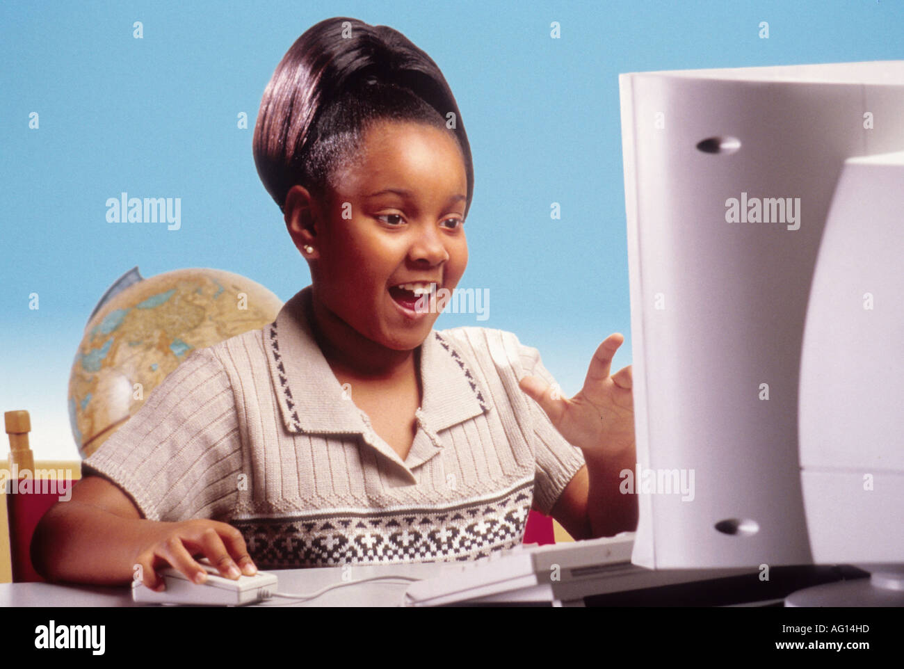 Young girl with computer Stock Photo - Alamy
