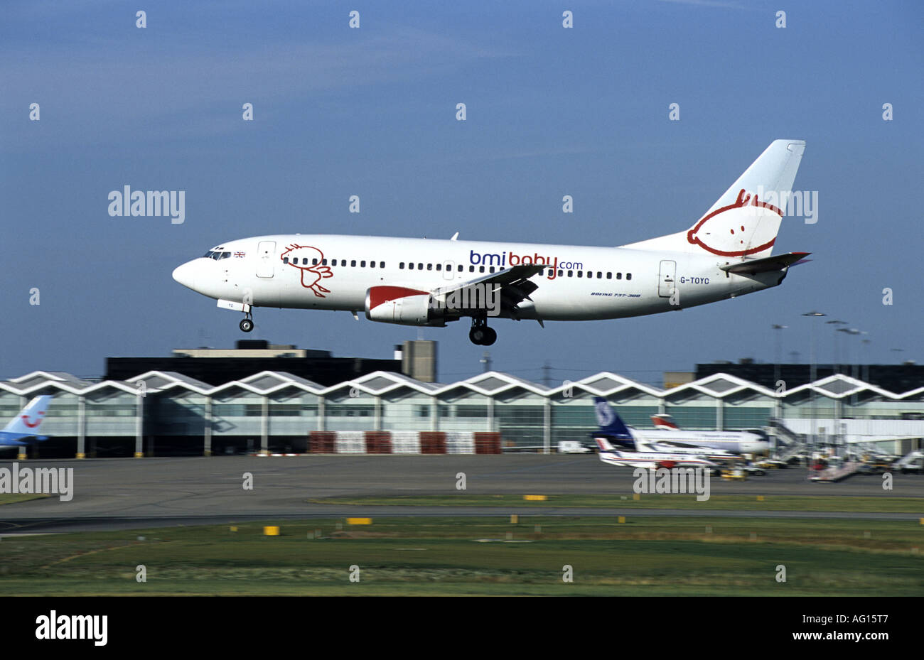 bmi baby Boeing 737 300 aircraft landing at Birmingham International ...
