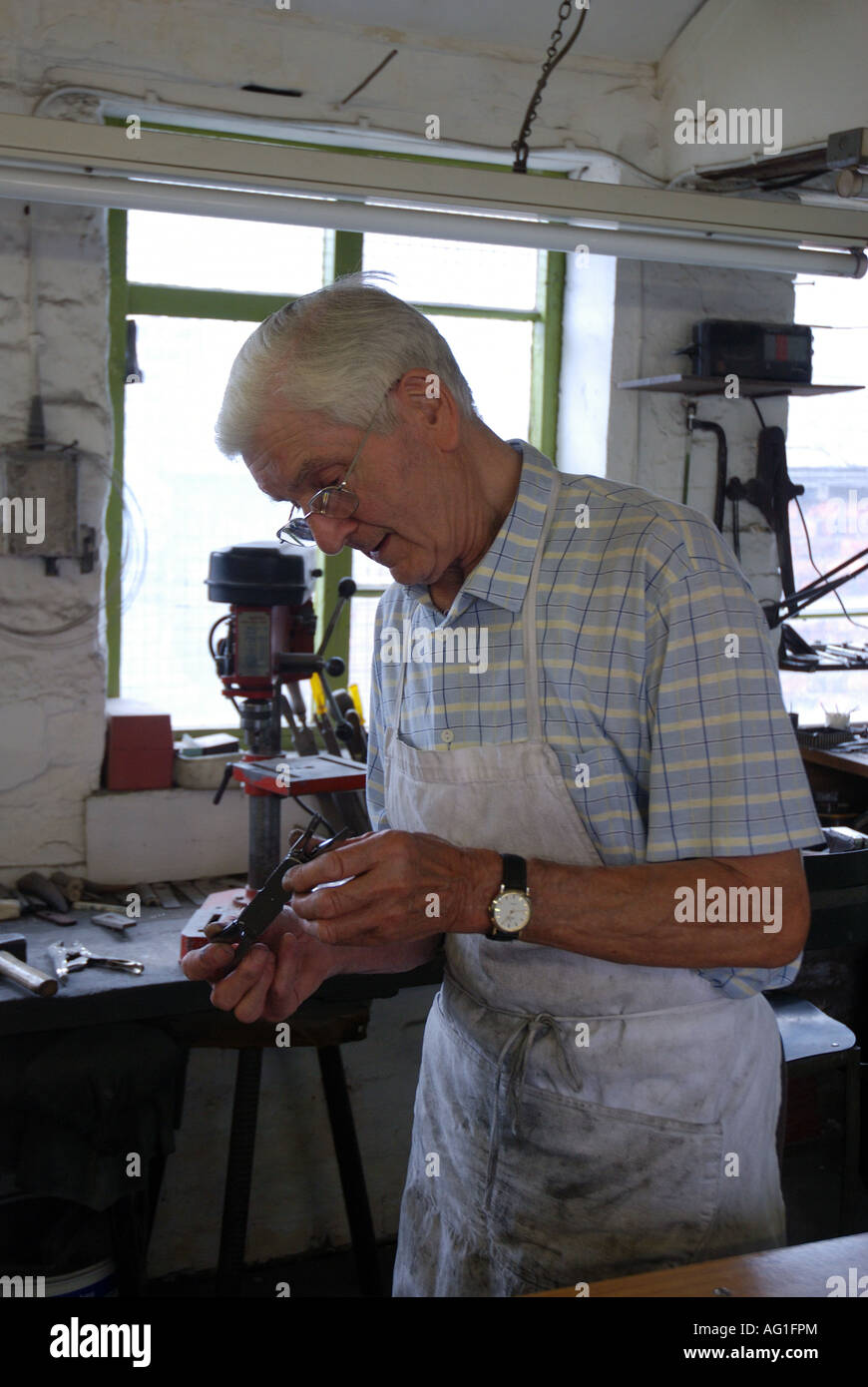 Stan Shaw, master craftsman and cutler in his workshop on Garden Street ...