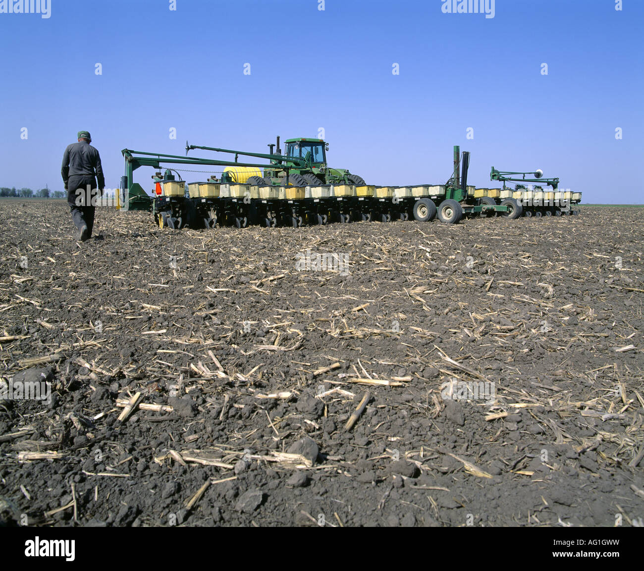 FARMER CHECKING ON PLANTER PRIOR TO PLANTING CHESTER IOWA Stock Photo ...