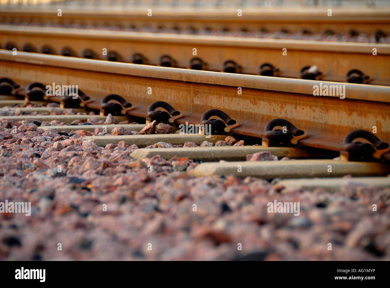 close-up rusted railroad tracks in perspective Stock Photo - Alamy
