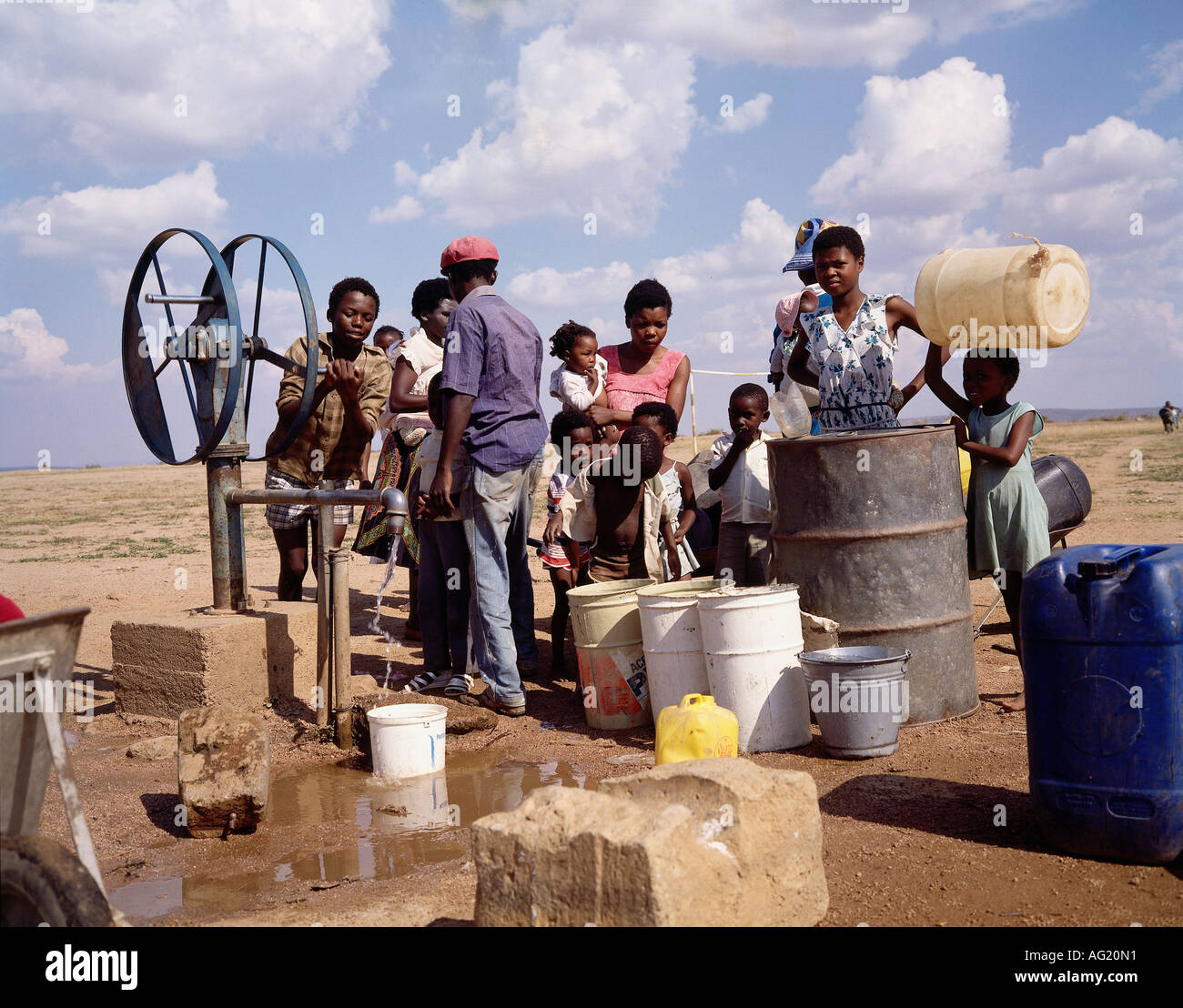 geography / travel, Botswana, people, standing round a water pump, well ...