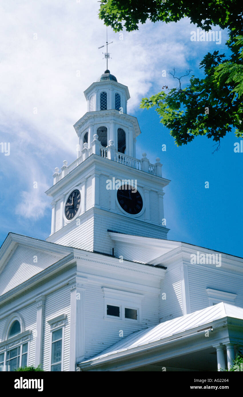 Clock tower, spire, and roof line of a traditional white church in New ...