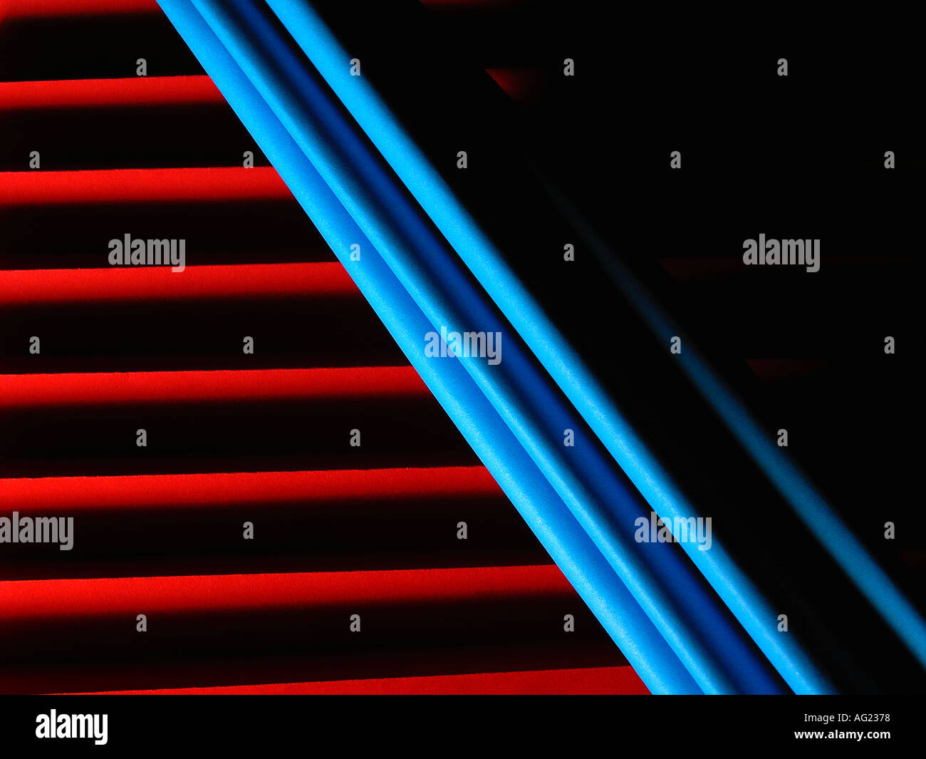 Folded paper blue cylinders intersecting red parallel lines Stock Photo ...