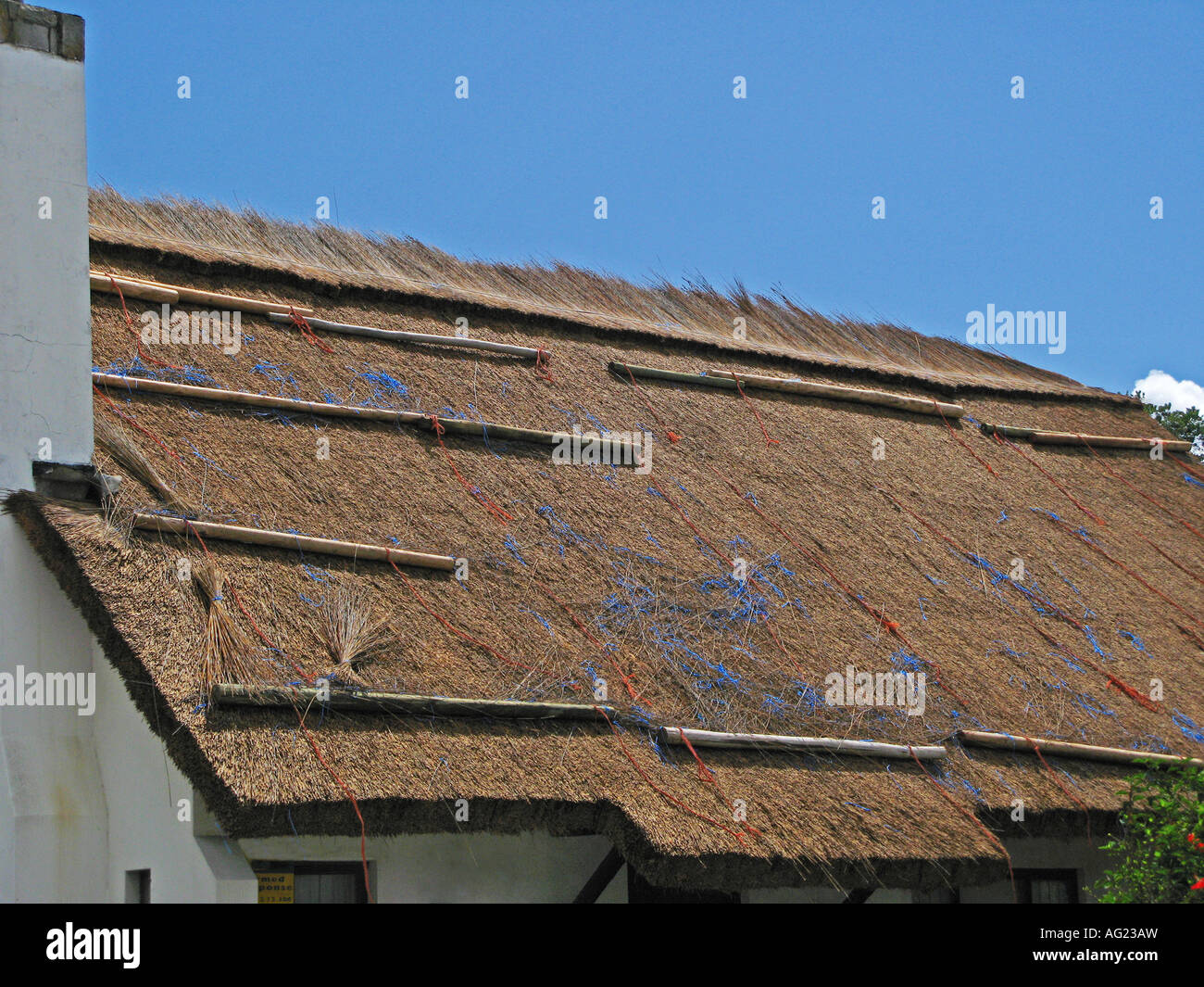 A thatched roof is relaced before the onset winter Stock Photo - Alamy