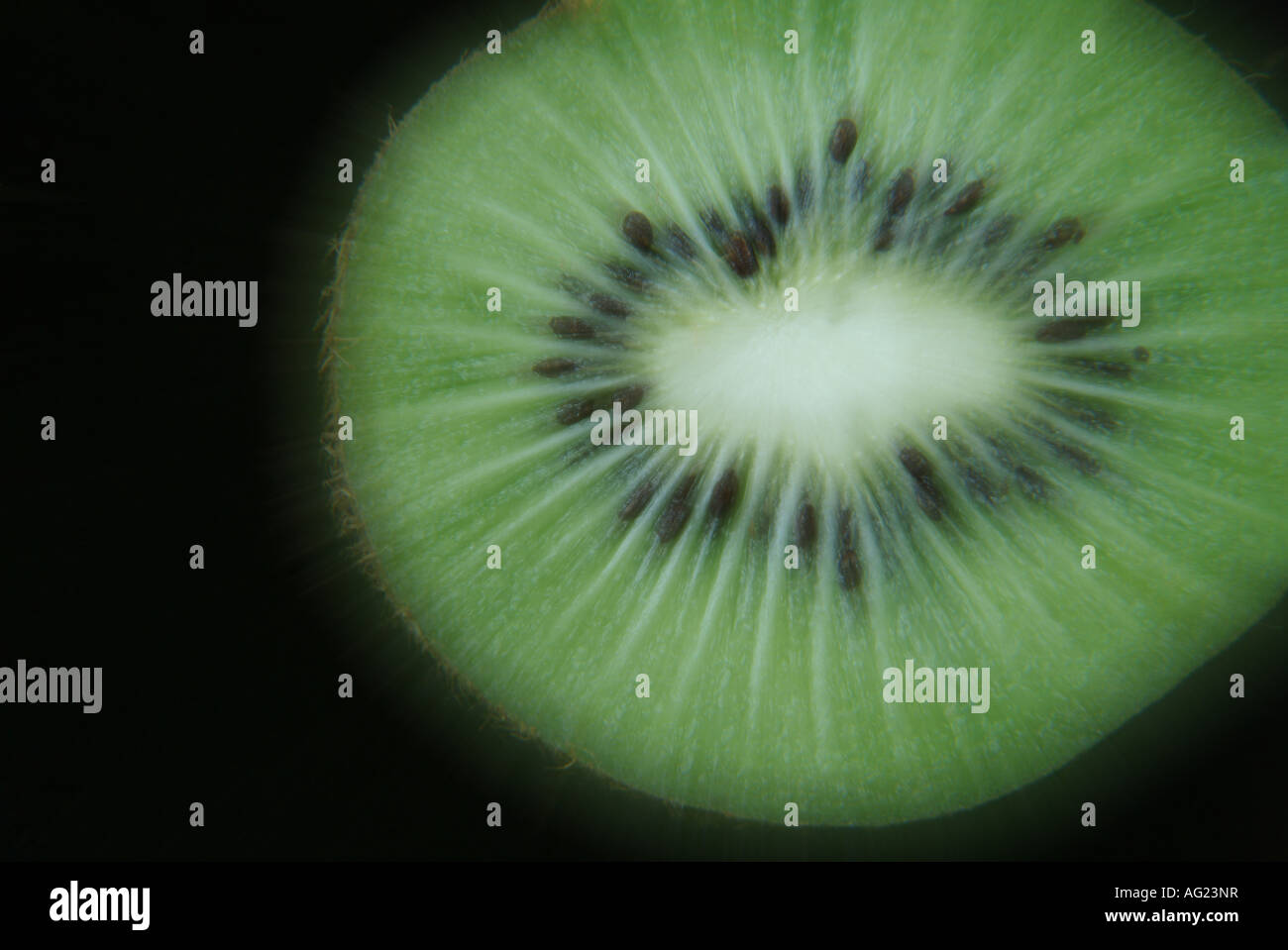 The inside of a kiwi fruit double image Stock Photo - Alamy