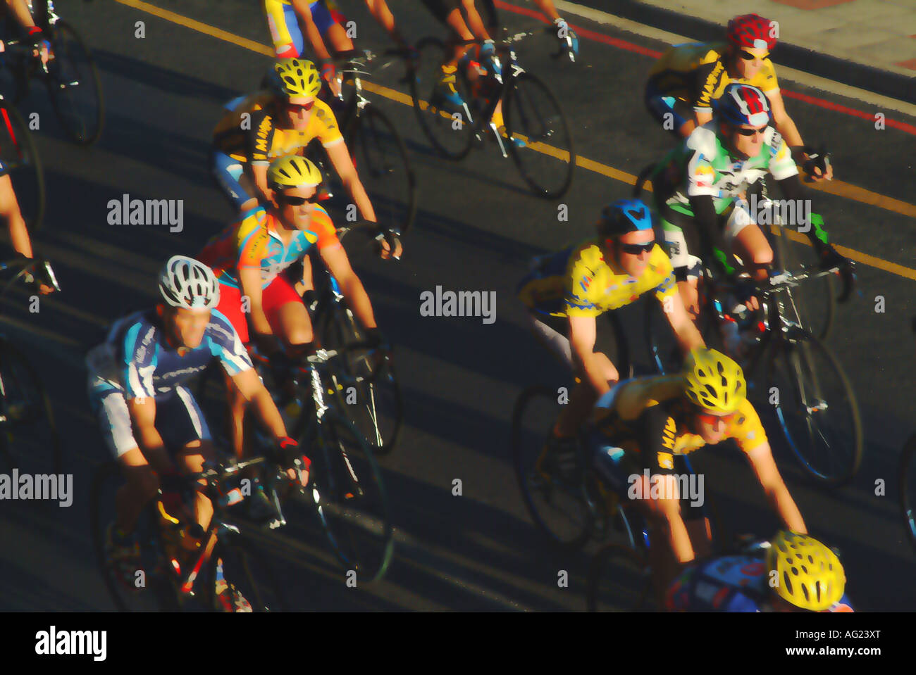 A group of cyclist on their way to the finish line towards the end of ...