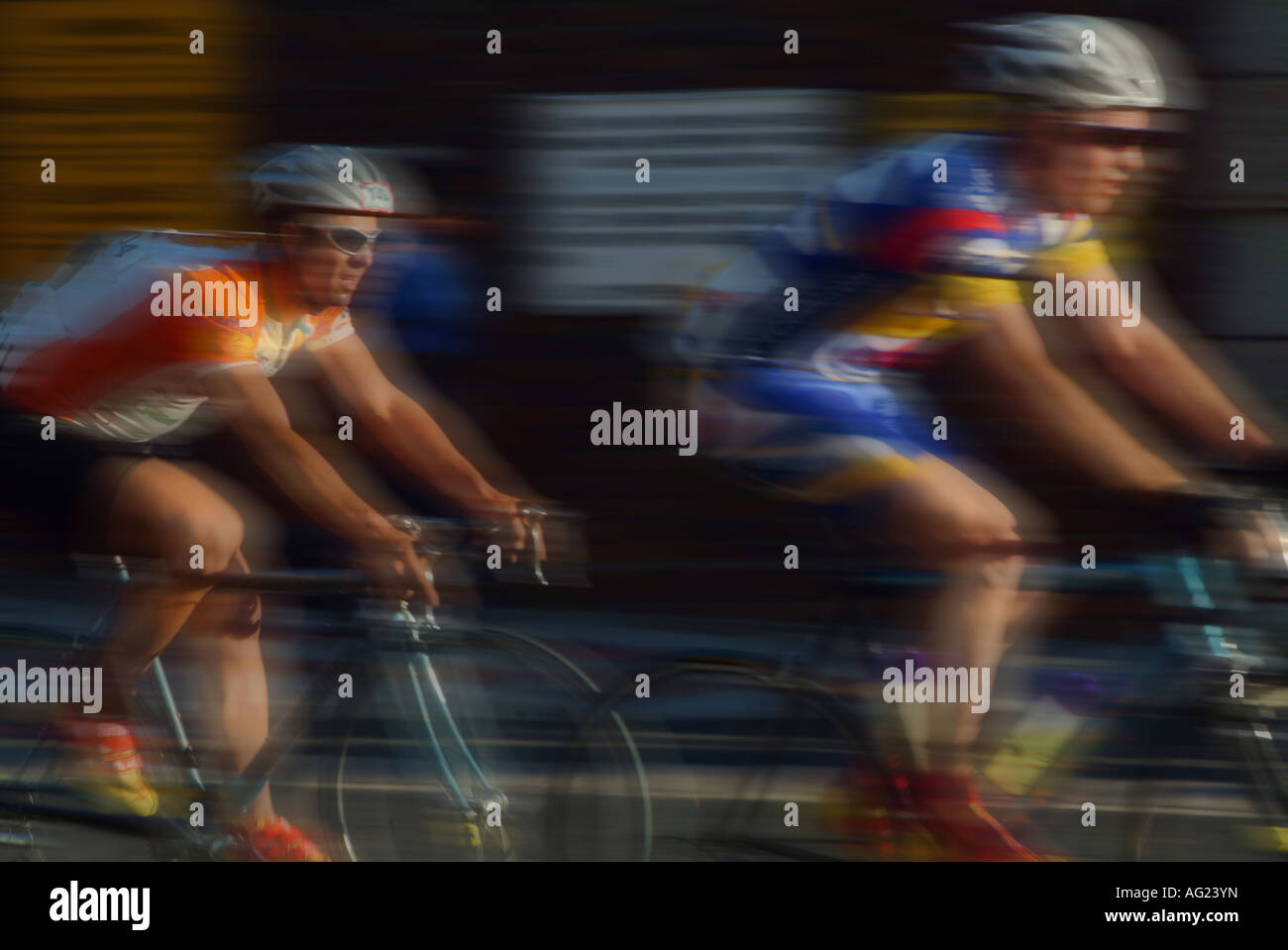 Two cyclists compete for position in a cycle race Stock Photo - Alamy